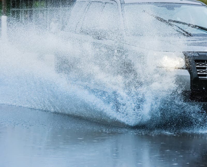 Car Rain Puddle Splashing Water Stock Photo - Image of speed, adventure ...