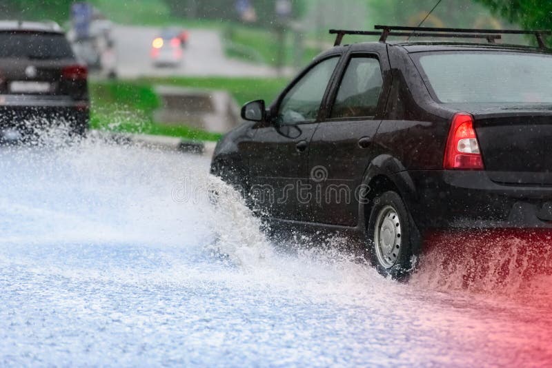 Car Rain Puddle Splashing Water Stock Photo - Image of drop, driving ...