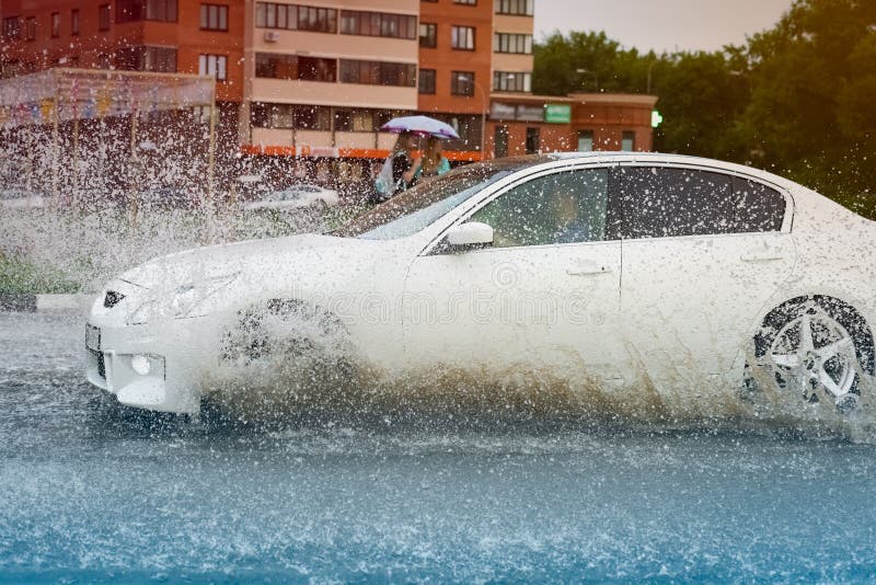 Car Rain Puddle Splashing Water Stock Image - Image of spray, blurred ...