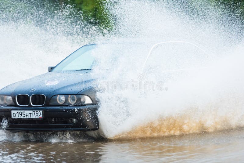 Car Rain Puddle Splashing Water Editorial Photo - Image of flood ...