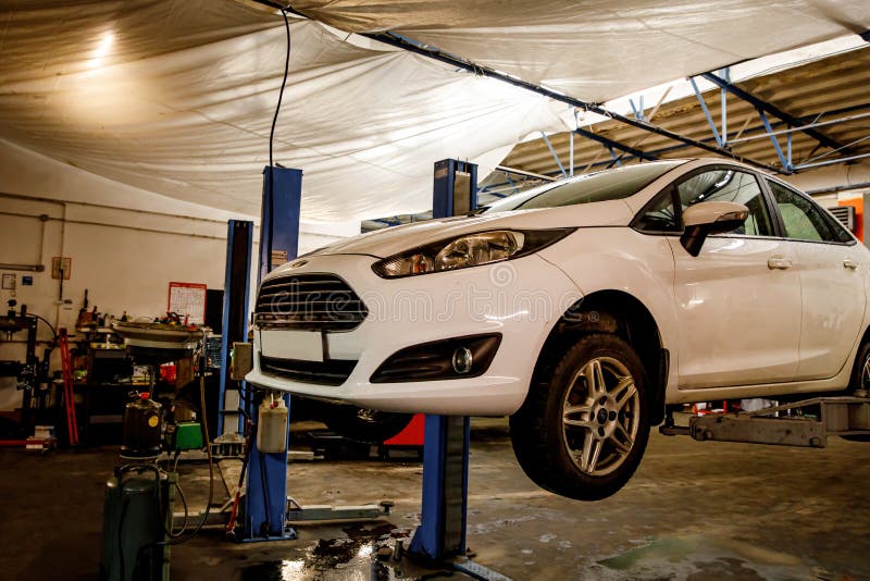 545 Auto Raised Car Lift Stock Photos - Free & Royalty-Free Stock ...