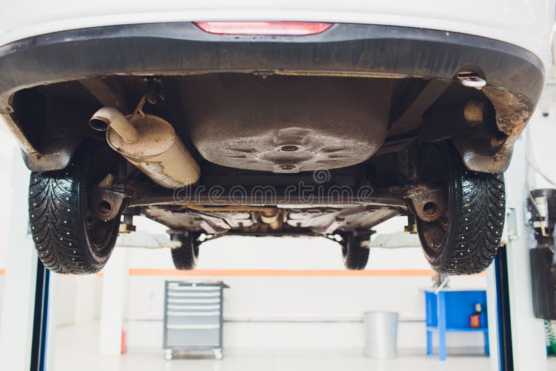 Car Raised on Car Lift in Autoservice Stock Image - Image of centre ...