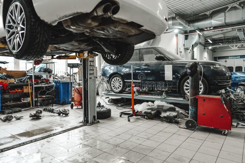 Car Raised on Car Lift in Car Service Shop Stock Image - Image of ...