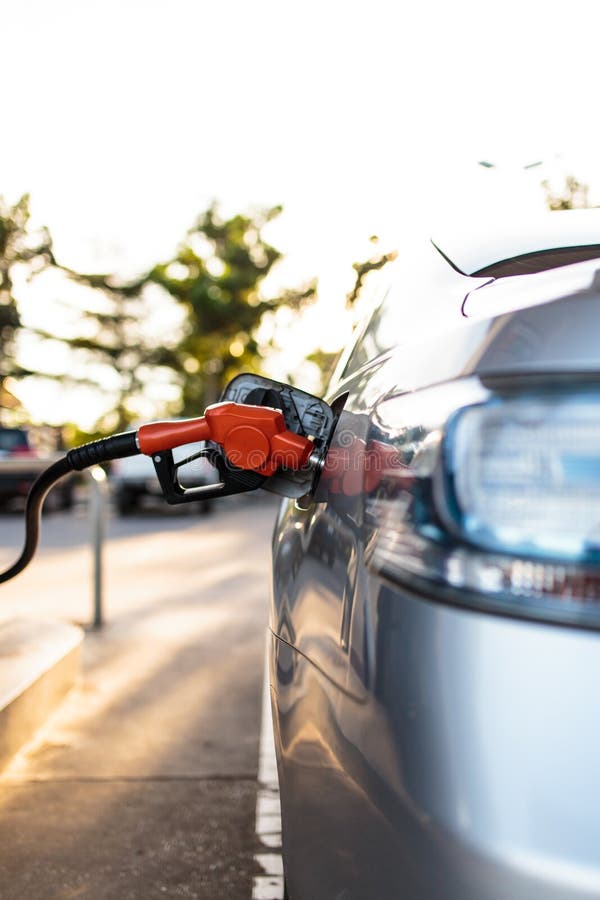Car refuel stock photo. Image of outdoors, garage, pipe - 53582710