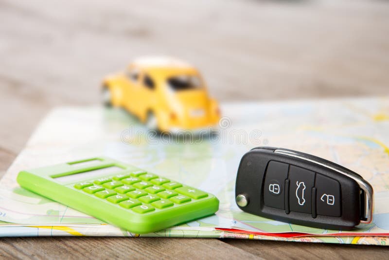 Car Rental Concept - Car Key and Calculator on the Map Stock Image ...
