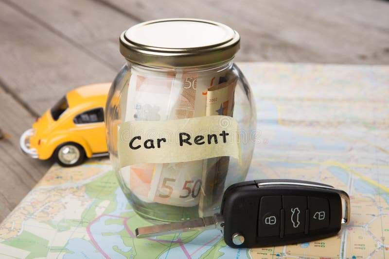 Car Rental Concept - Car Key and Money Jar on the Map Stock Photo ...