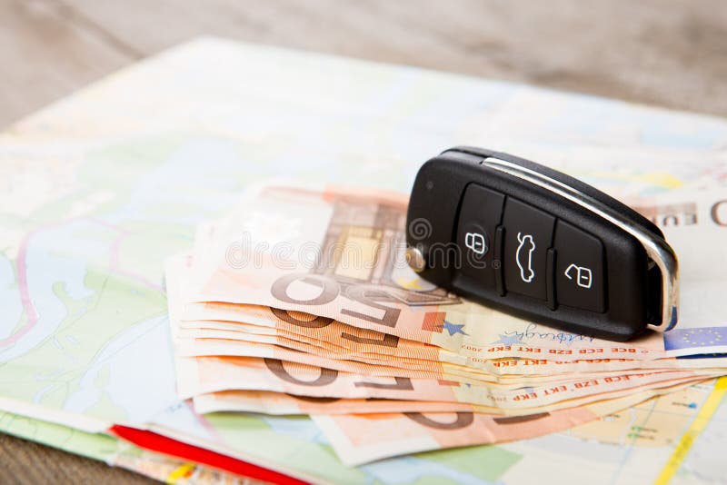 Car Rental Concept - Car Key and Money on the Map Stock Photo - Image ...