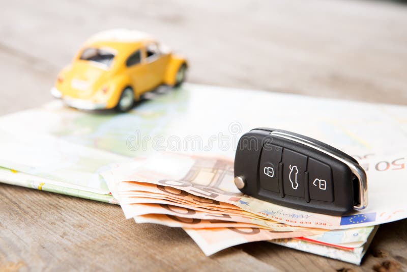 Car Rental Concept - Car Key and Money on the Map Stock Photo - Image ...
