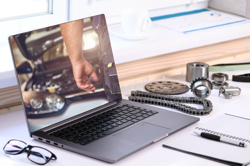 . Car Repair Courses. on the Table are a Computer and Tools for Car ...
