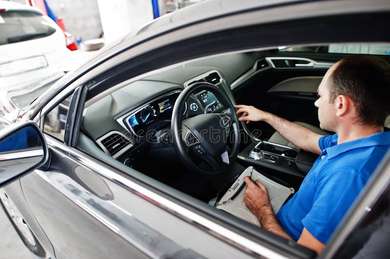 Car Repair and Maintenance Theme. Electric Mechanic in Uniform Working ...
