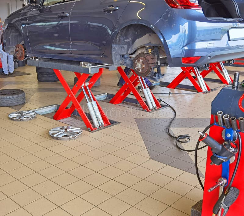 Car Repair Shop Tire Change Stock Photo - Image of change, technician ...