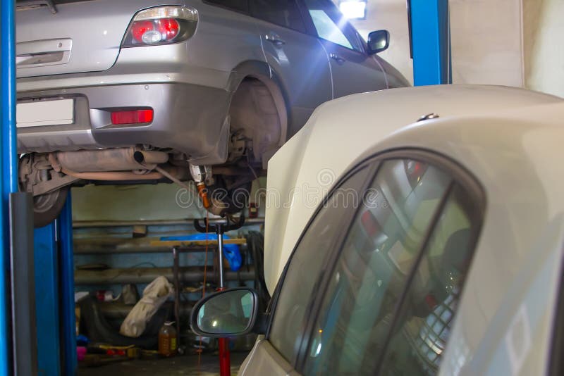 Car Repair Station Interior Stock Image - Image of elevator, motor ...