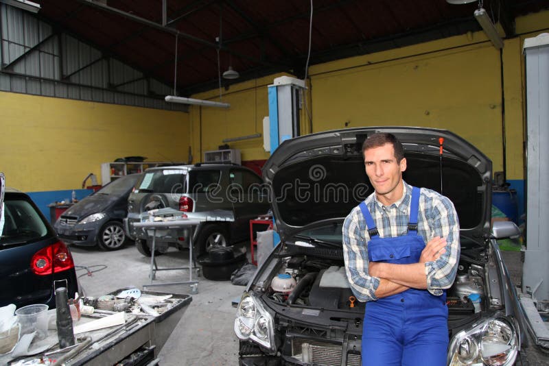 Car repairer stock image. Image of owner, overalls, motor - 16577777