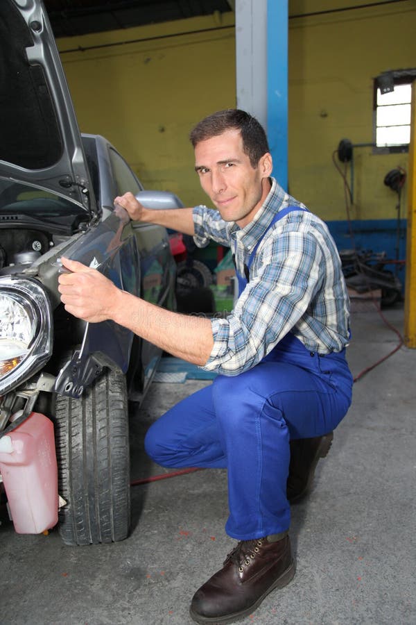 Car repairer at work stock image. Image of repairer, mechanic - 16577755
