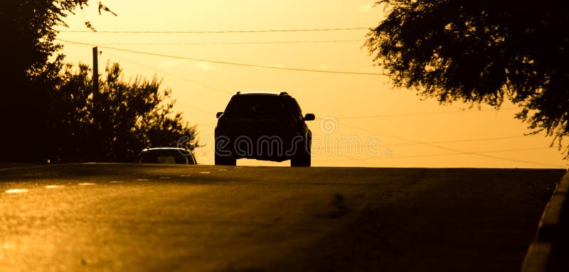Car Rides on the Road at Sunset Stock Image - Image of highway, vehicle ...