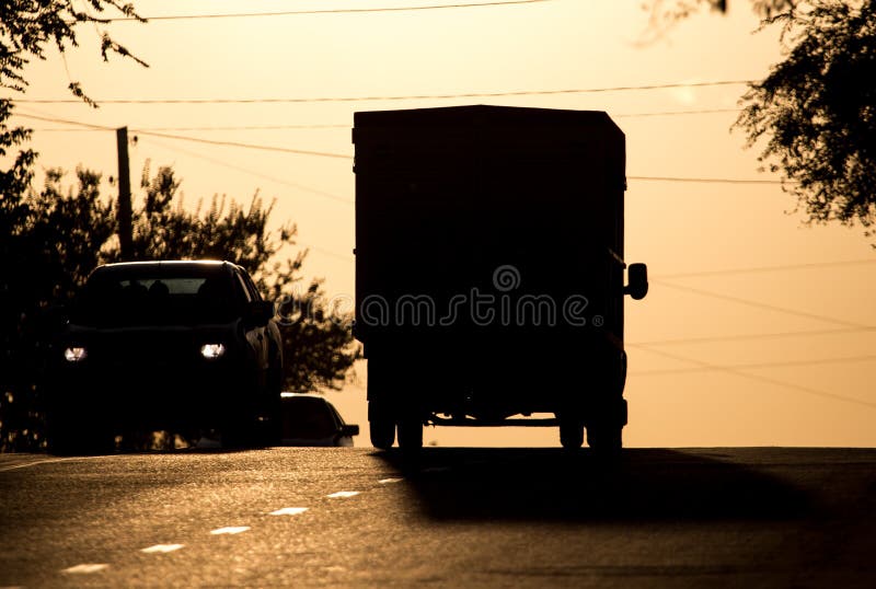 Car Rides on the Road at Sunset Stock Image - Image of transport, trip ...