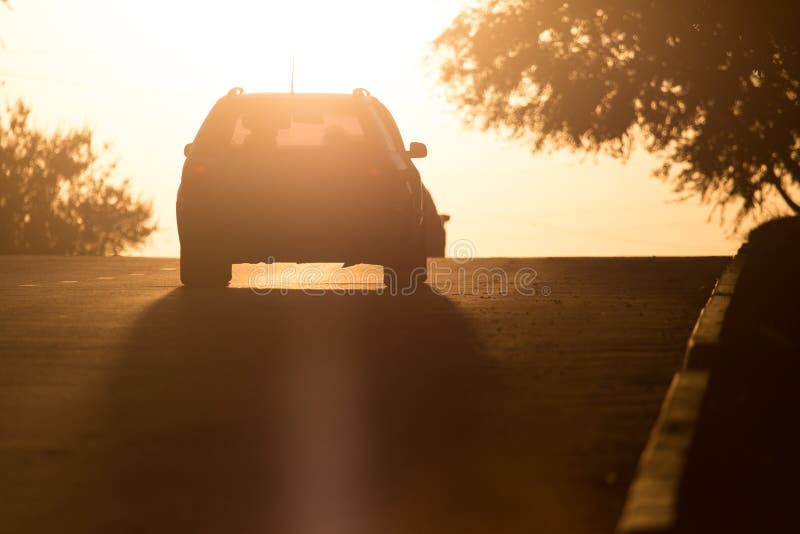 Car Rides on the Road at Sunset Stock Photo - Image of drive, transport ...