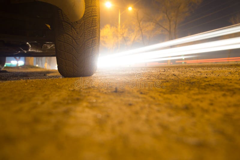Car on the road at night stock image. Image of evening - 108944471