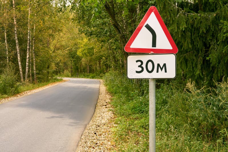 Car Road Sign Dangerous Turn Stock Photo - Image of distance, trees ...