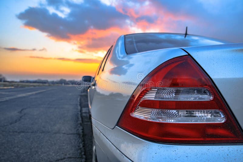 Car in road stock image. Image of vehicle, nature, sunset - 195065625