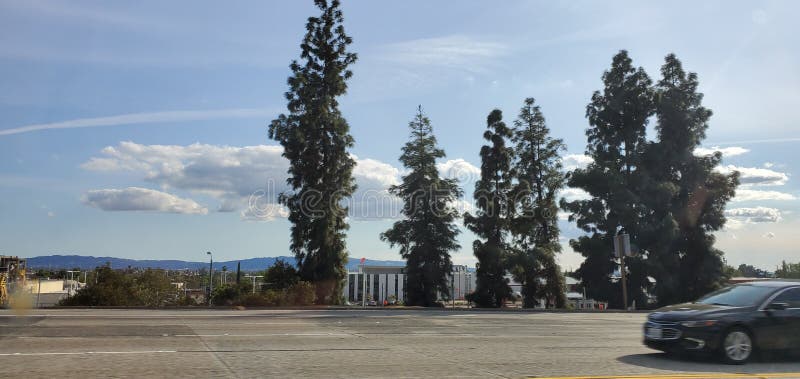 Car on the road and trees stock photo. Image of hill - 175246548