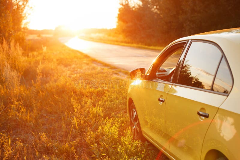 Car roadside at sunset stock photo. Image of coniferous - 97925462