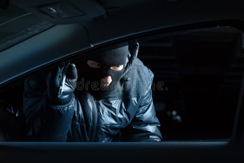 Car robber at night stock photo. Image of night, murderer - 67251178
