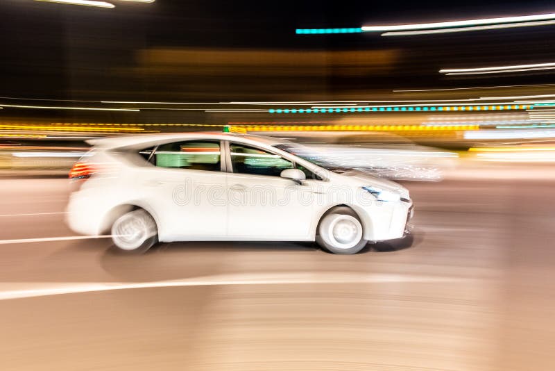 Car Rolling at Full Speed through the City at Night, Image of Panning ...