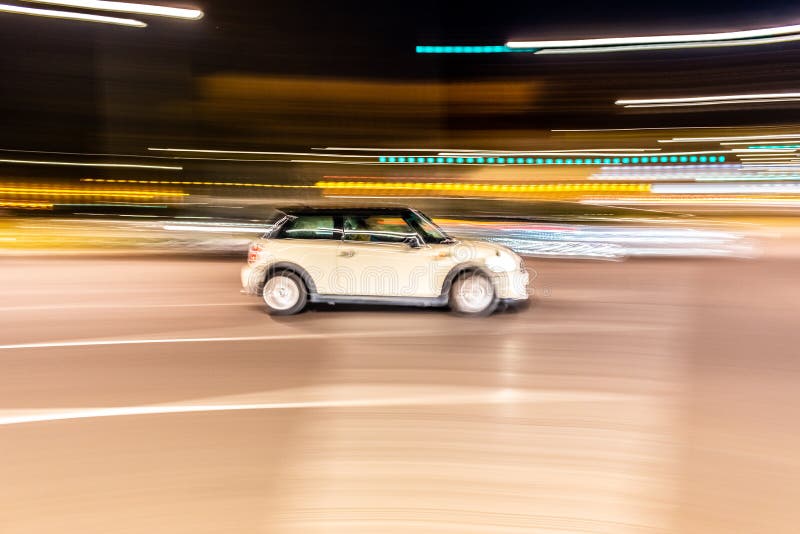 Car Rolling at Full Speed through the City at Night, Image of Panning ...