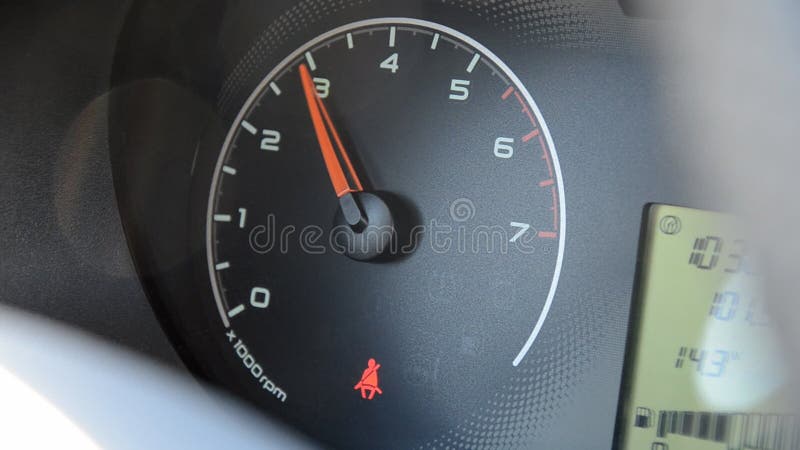 Close-up of a Tachometer and Fuel Gauge in a Car. the Instrument Panel ...