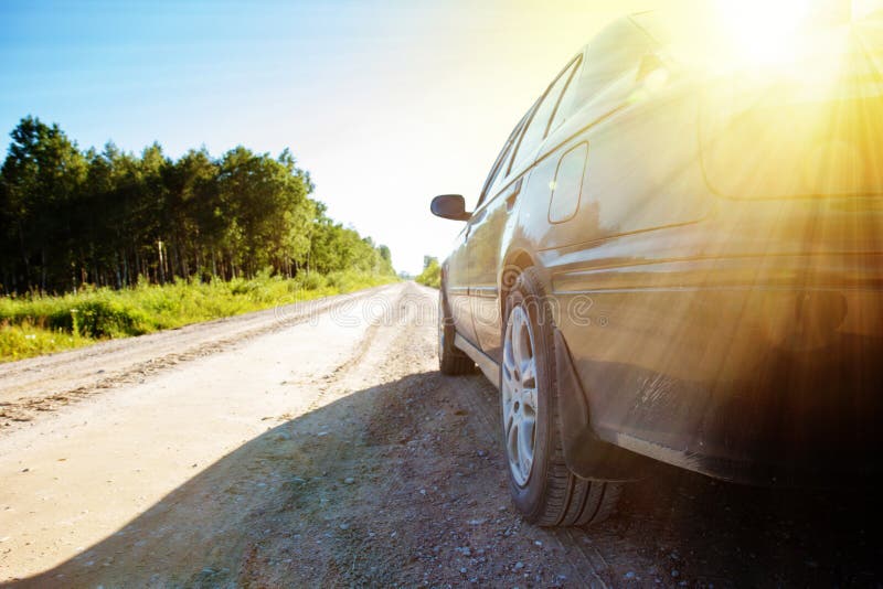 Car on rural road stock image. Image of glow, nature - 100742067