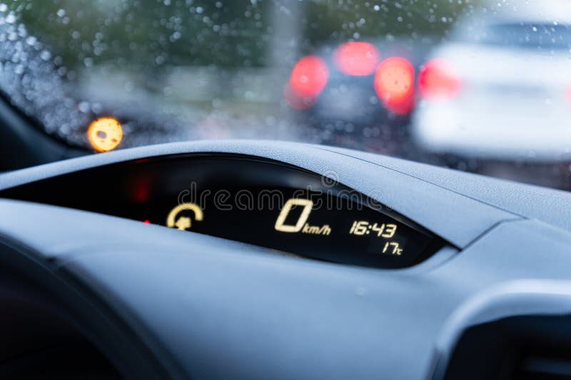 A Car S Dashboard Features a Speedometer Reading Zero while Displaying ...