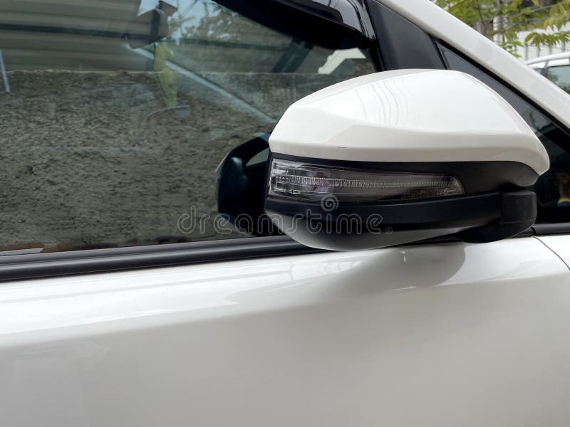 The Car S Rearview Mirror Folds with a Round Oval Light Shape Editorial ...