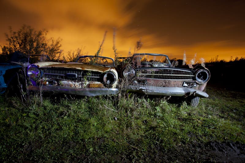 Car scrap yard at night stock image. Image of rusty, smashed - 24622267