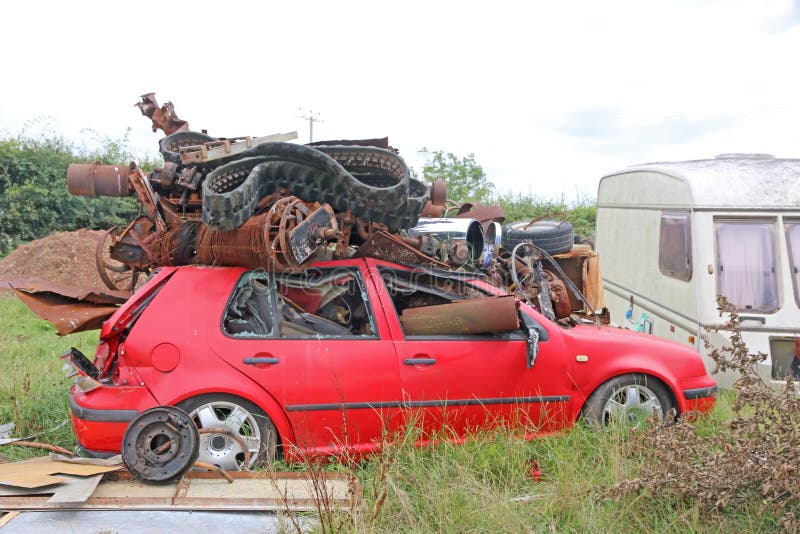 Car in a scrap yard stock image. Image of recycle, industrial - 242431153