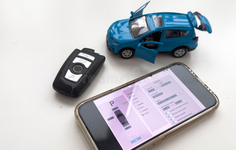 Car Security Concept - Key with Remote Alarm Control and Smartphone ...