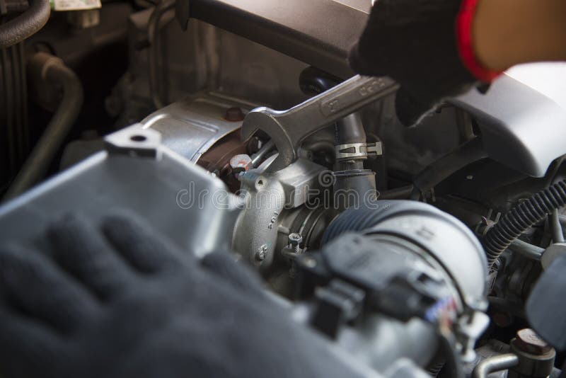 Fitting a Car Battery with Wrench Stock Image - Image of people ...