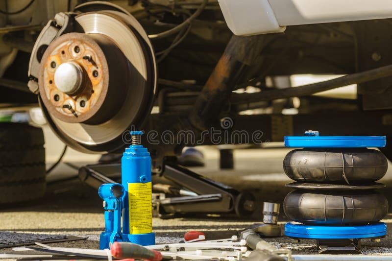 Car in Service. Installing Air Ride Suspension Stock Photo - Image of ...