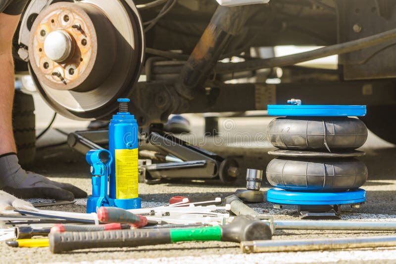 Car in Service. Installing Air Ride Suspension Stock Image - Image of ...