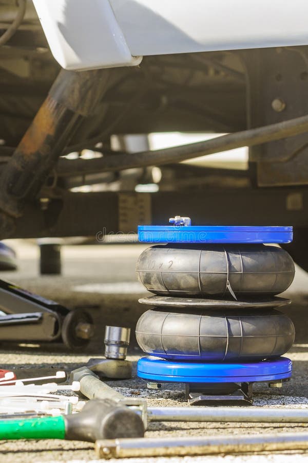 Car in Service. Installing Air Ride Suspension Stock Image - Image of ...