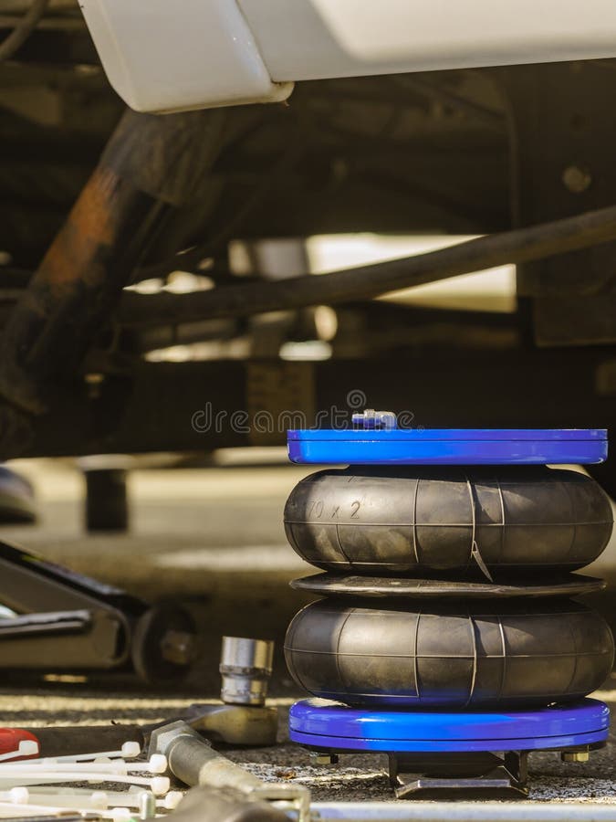 Car in Service. Installing Air Ride Suspension Stock Image - Image of ...