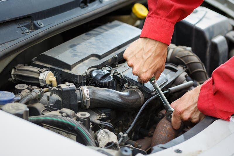 Car Mechanic Working in Auto Repair Service. Stock Image - Image of ...