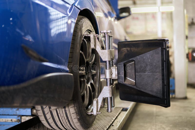 Car in Service with Sensors on the Wheels To Check Alignment Camber Toe ...
