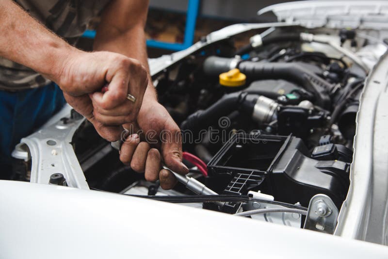 Car Mechanic Working in Auto Repair Service. Stock Image - Image of ...