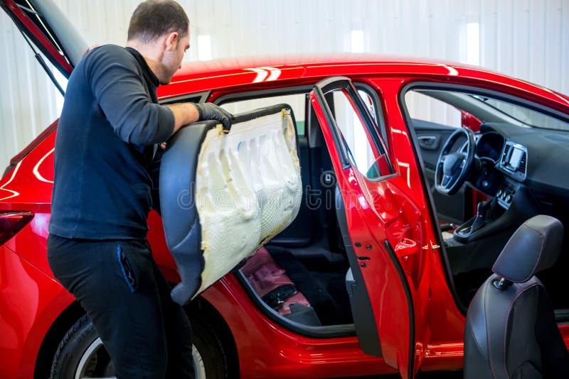 Car Service Worker Disassemble the Interior of the Car Stock Image ...