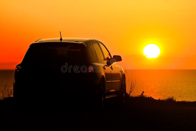 Car and setting sun stock photo. Image of natural, ocean - 5192600