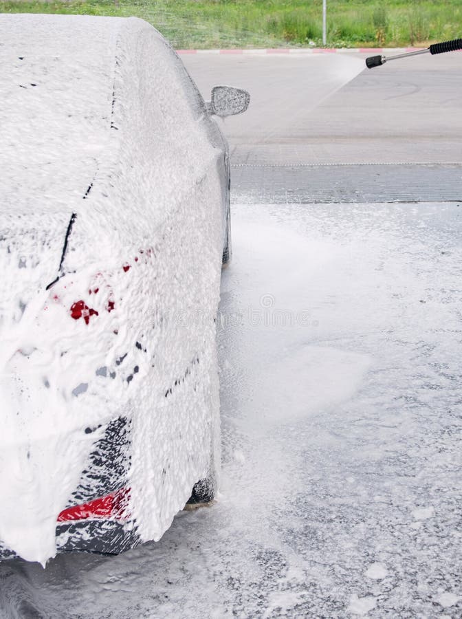 Car on the Side in the Foam and Bubbles from the Detergent in the Car ...