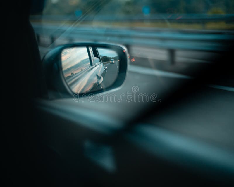 Car Side Mirror View in the Highway. Fast-moving Automobile Concept ...