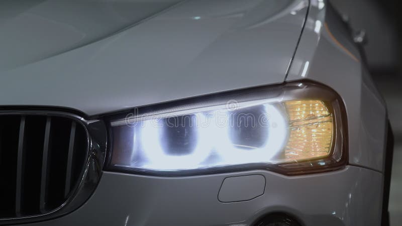 Car with Sidelight and Headlight Blink Close in Stock Footage - Video ...