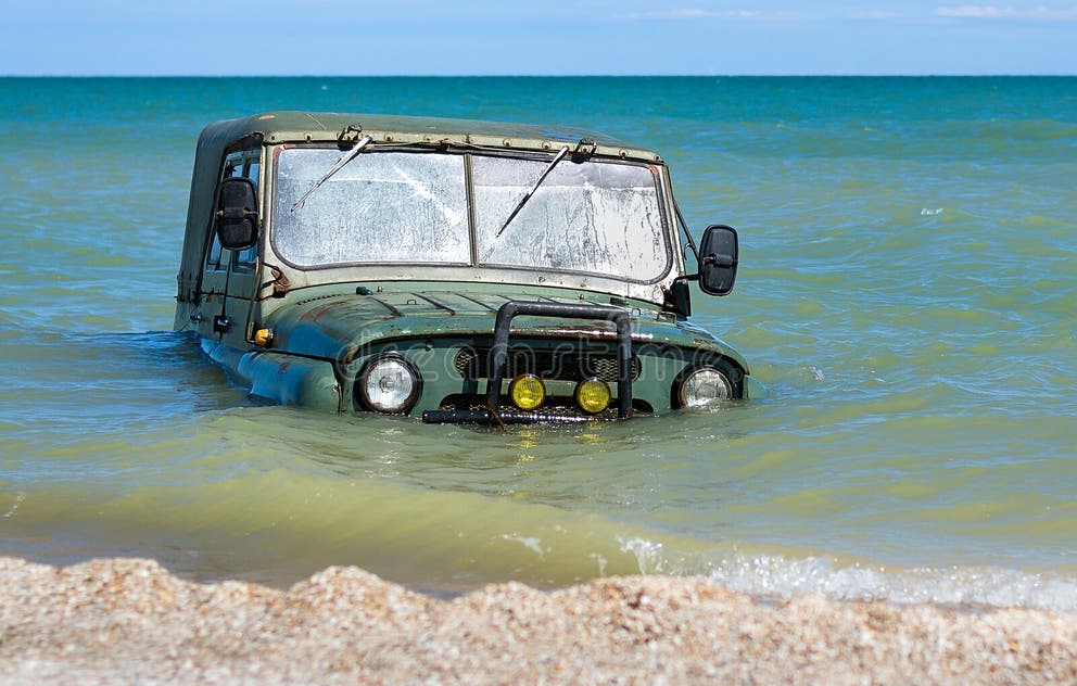 Car sinking in the sea stock image. Image of flood, coast - 82622913